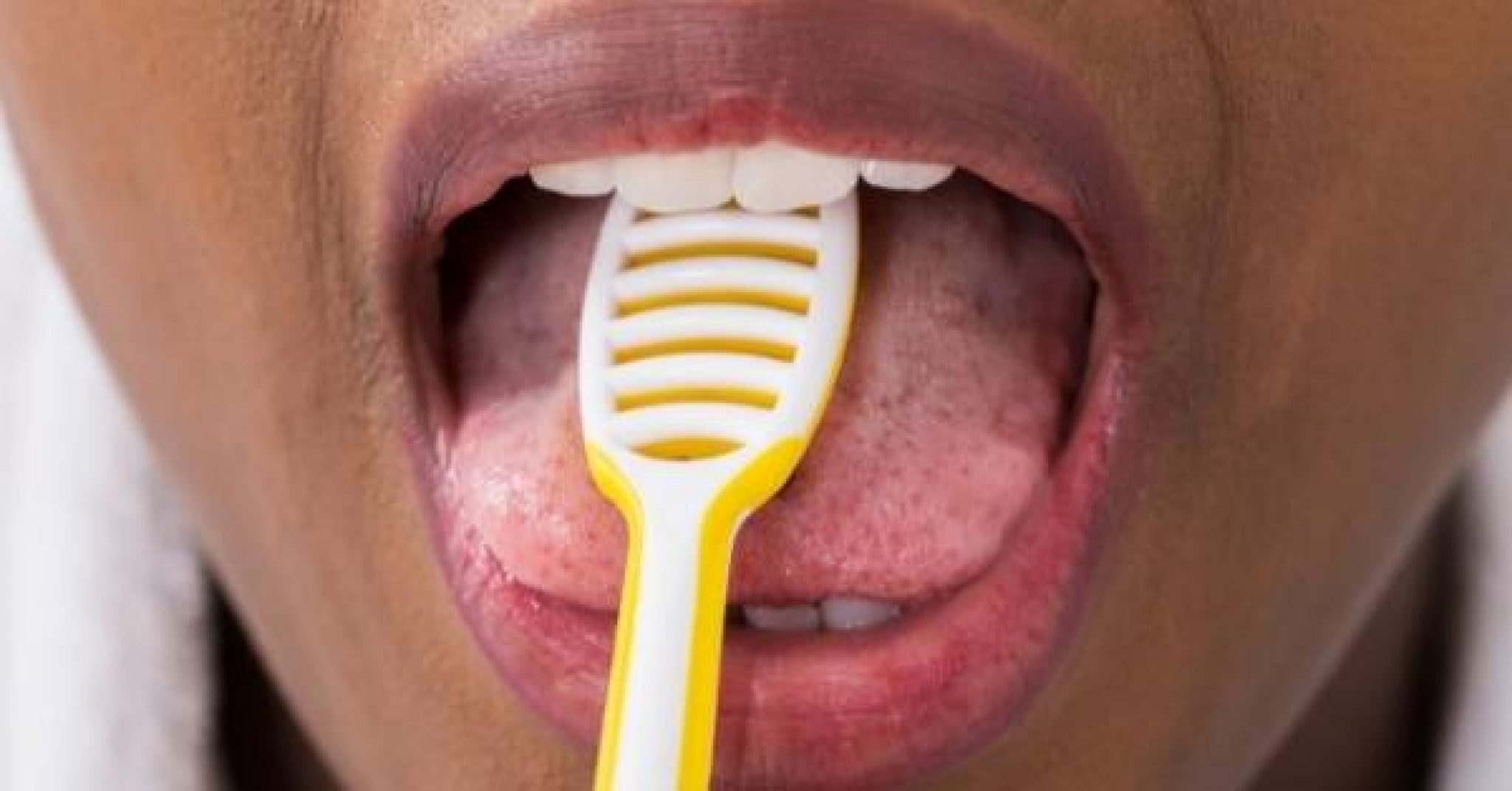 15 Benefits Of Tongue Scraping And How To Do It Properly!