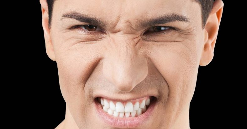 How To Stop Clenching Jaw: At Home & Professional Treatments!